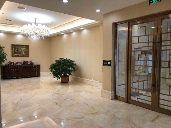 Ganghui Four Seasons Hotel Apartment (Dalian Railway Station Zhongshan Square) - Dalian