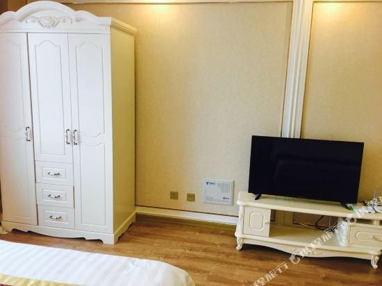 Golden Harbor Hui Hotel Apartment (Dalian Friendship Square Railway Station Store) - Dalian